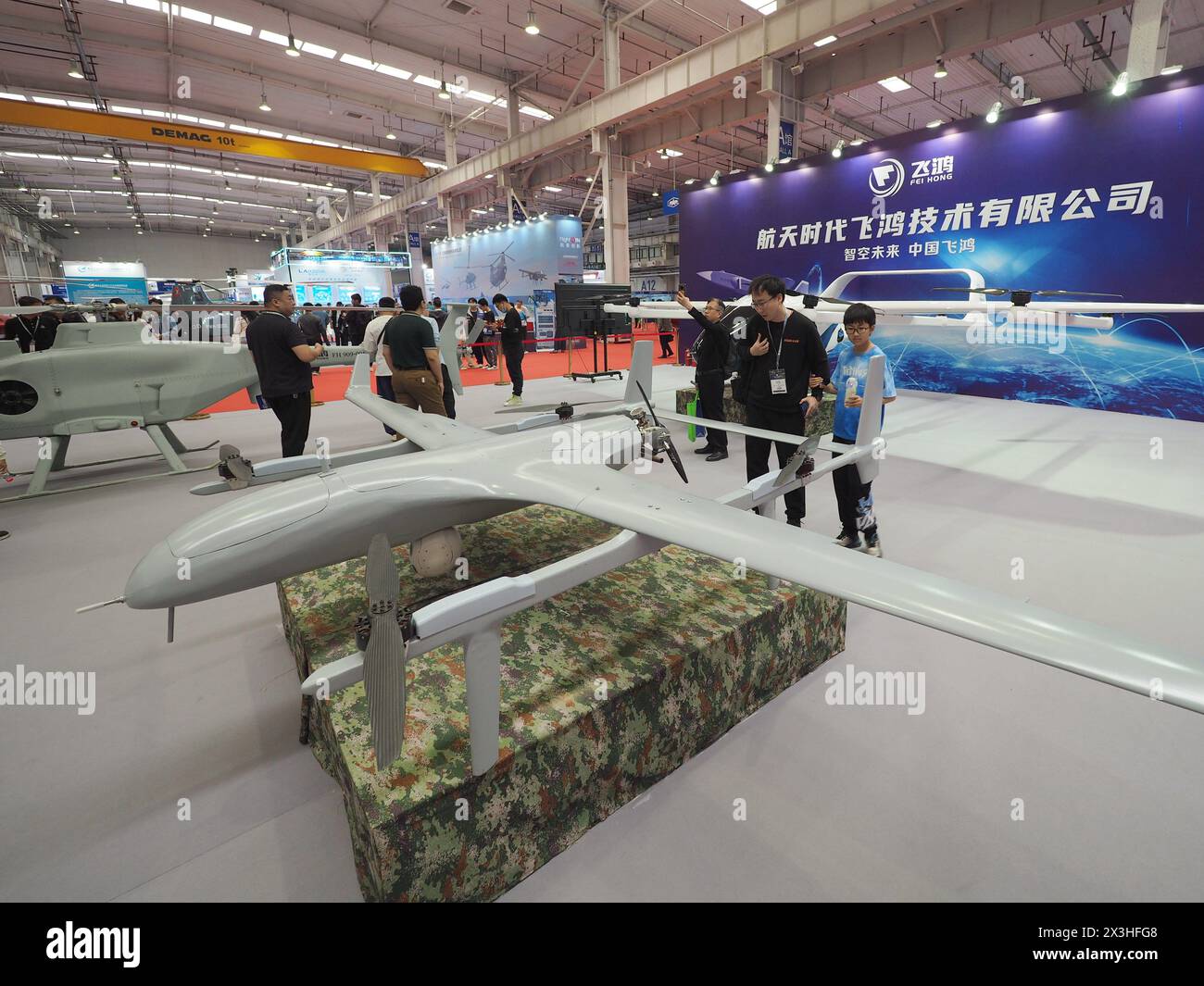 BEIJING, CHINA - APRIL 27, 2024 - Visitors view a "composite wing UAV ...