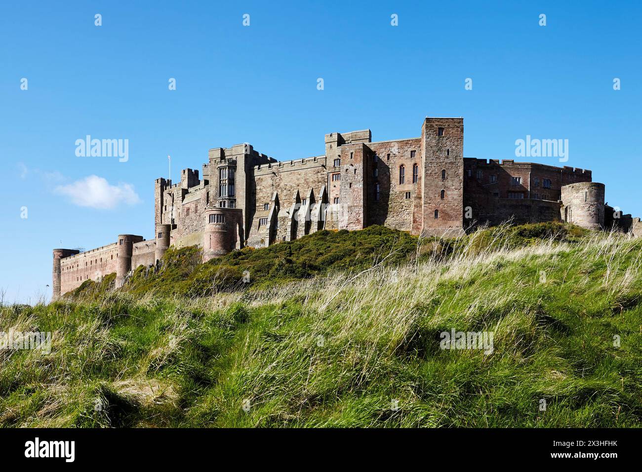 Bamburgh Castle - wide view looking north from landslide with ...