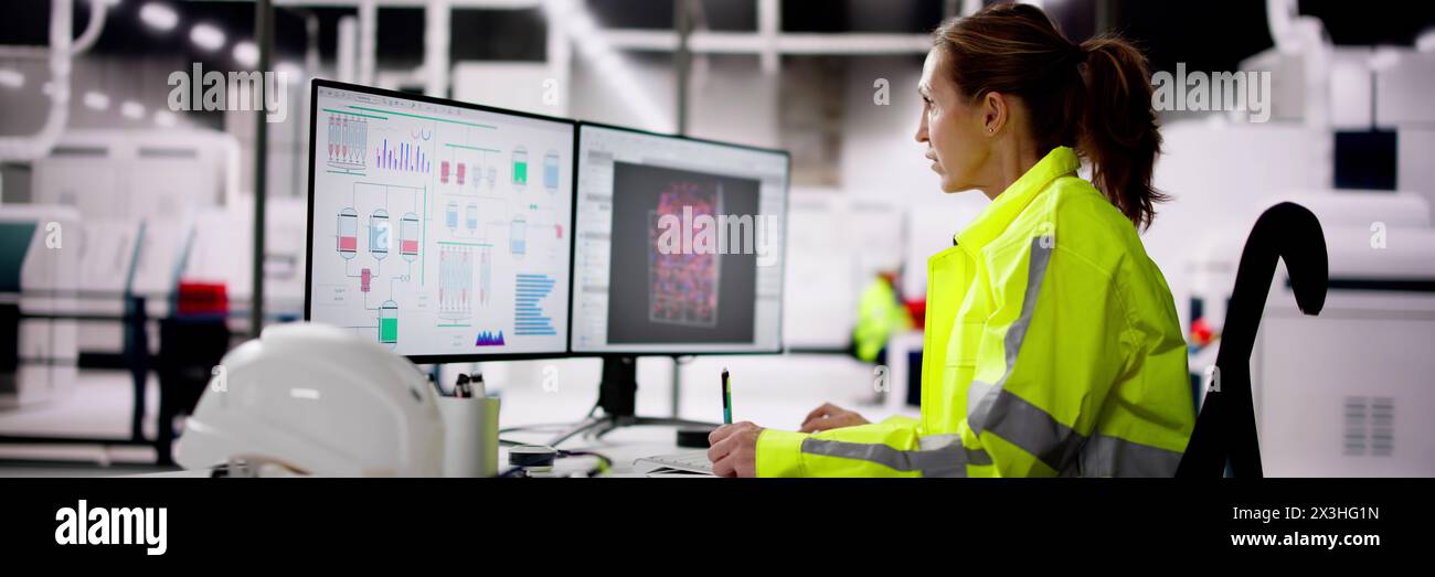 Operator and engineer monitor SCADA system using control Stock Photo ...