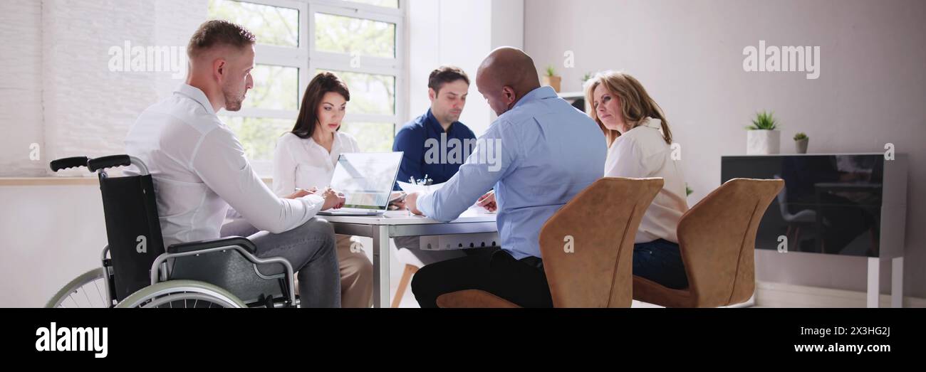 Disabled Business People in Wheelchairs Meeting in Workplace Stock ...