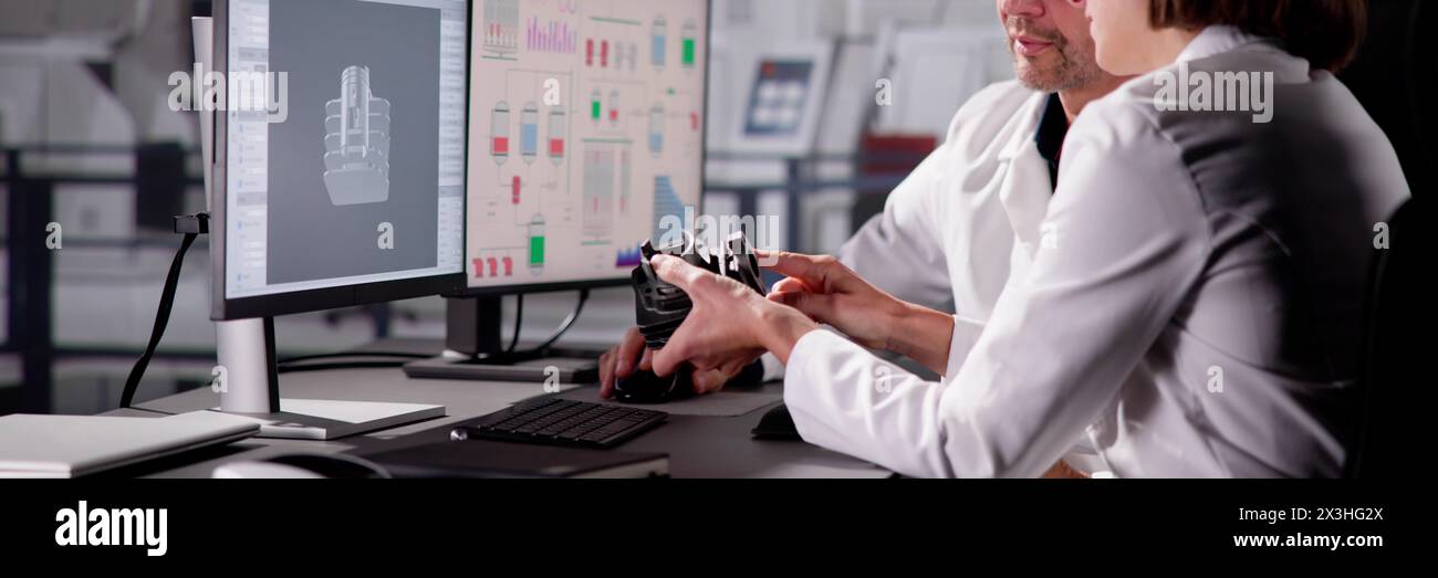 Engineer designing 3D software model for engineering development Stock ...