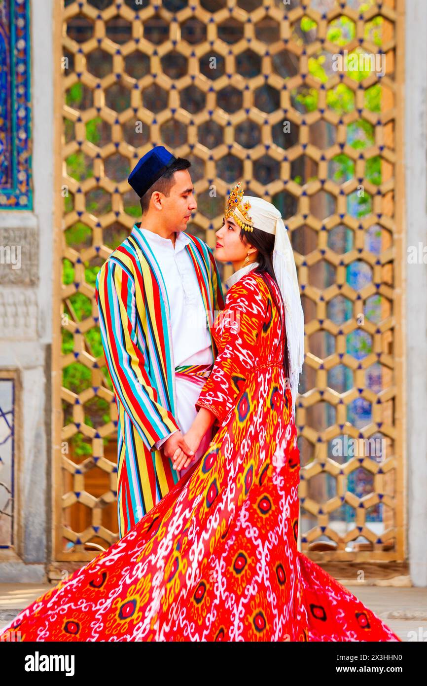 Samarkand, Uzbekistan - April 18, 2021: Bride and groom in traditional ...