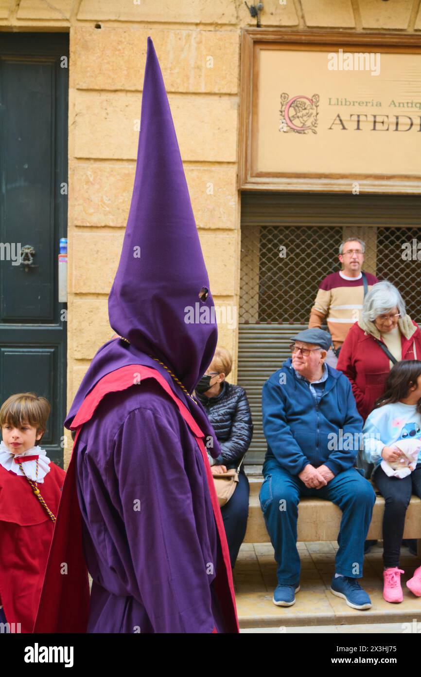 Tarragona, Spain - April 26, 2024: Solemn procession with penitents and ...