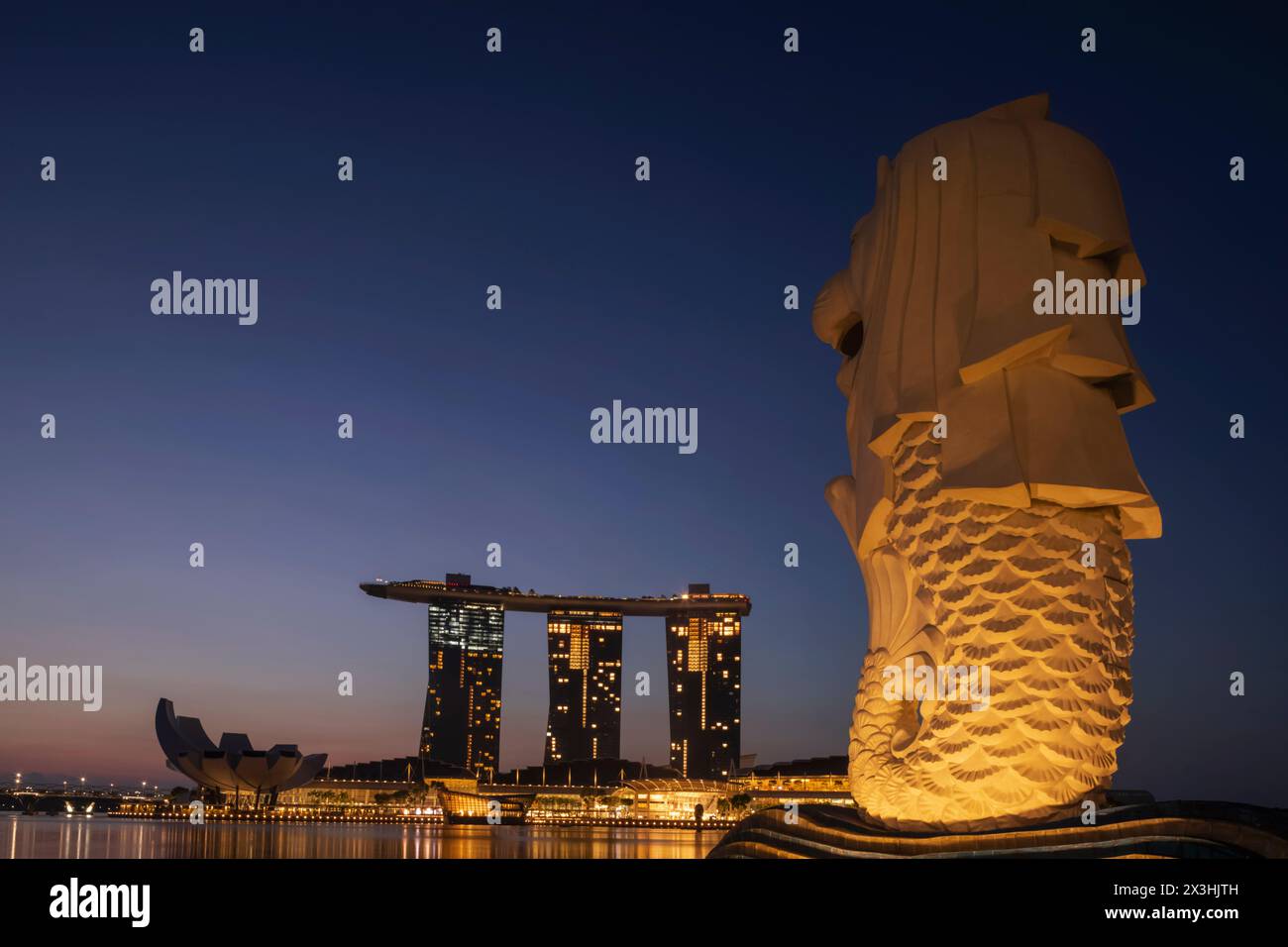 Asia, Singapore,Marina Bay Sands luxury hotel and the Merlion statue at ...