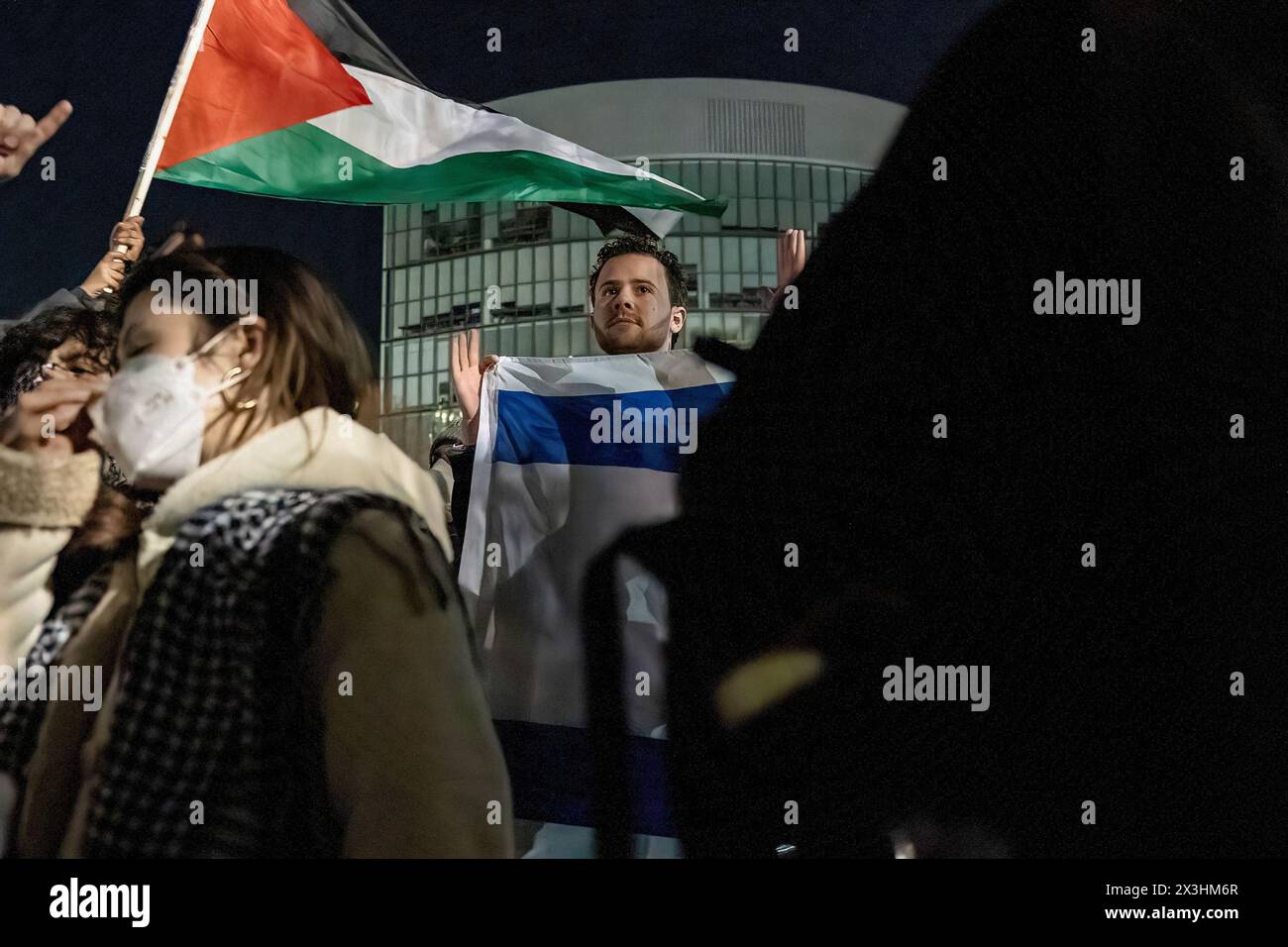 Demonstrators wave flags during the pro-Palestine encampment protest ...