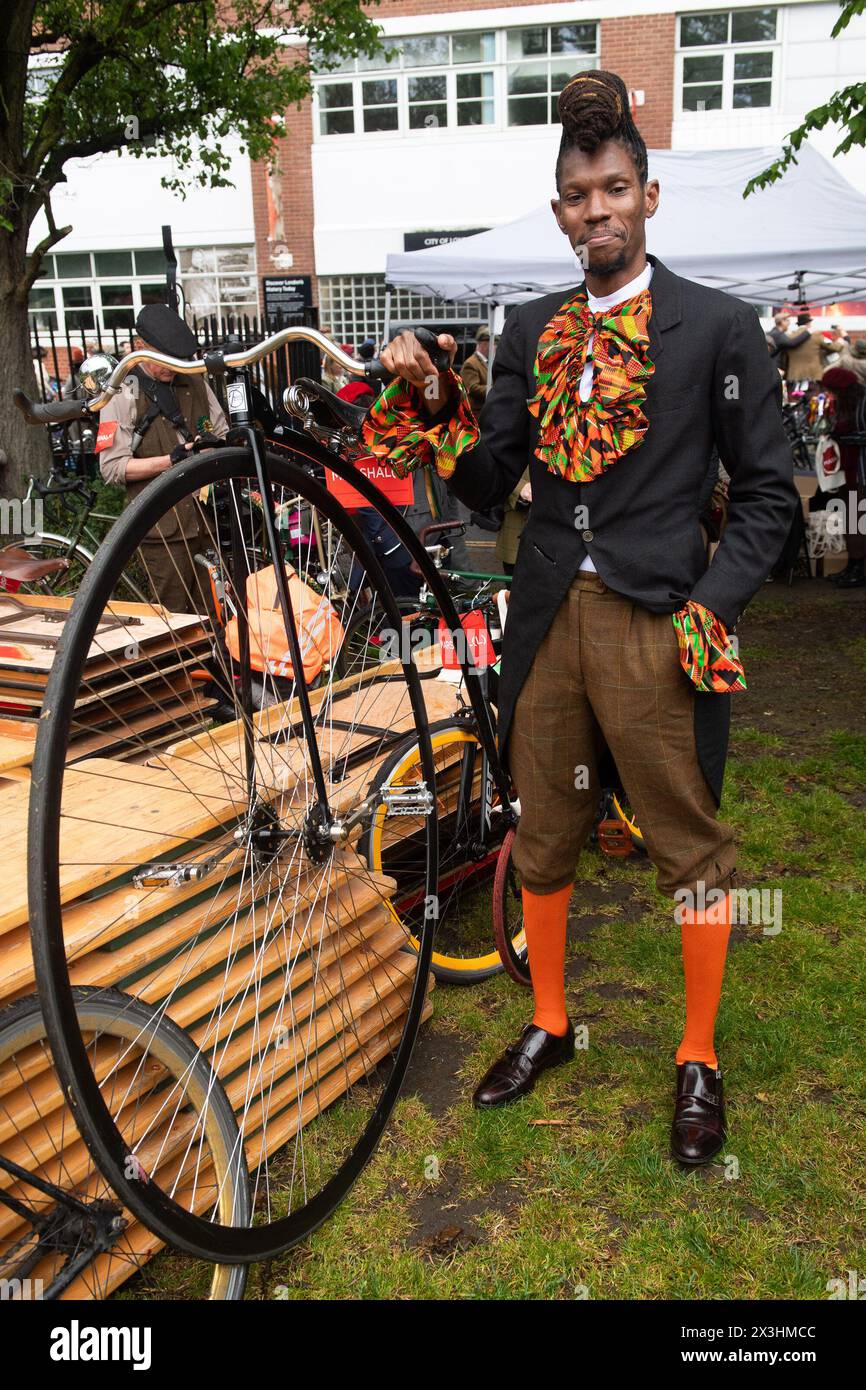 London, UK. 27 Apr 2024. Participants in the Tweed Run pose for a photo ...