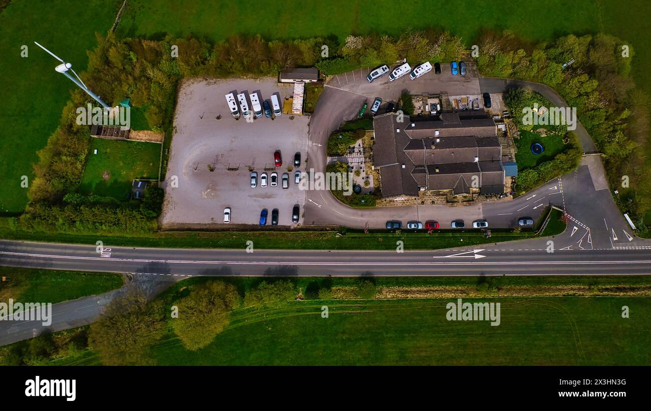 Aerial view of a rural roadside establishment with a parking lot ...