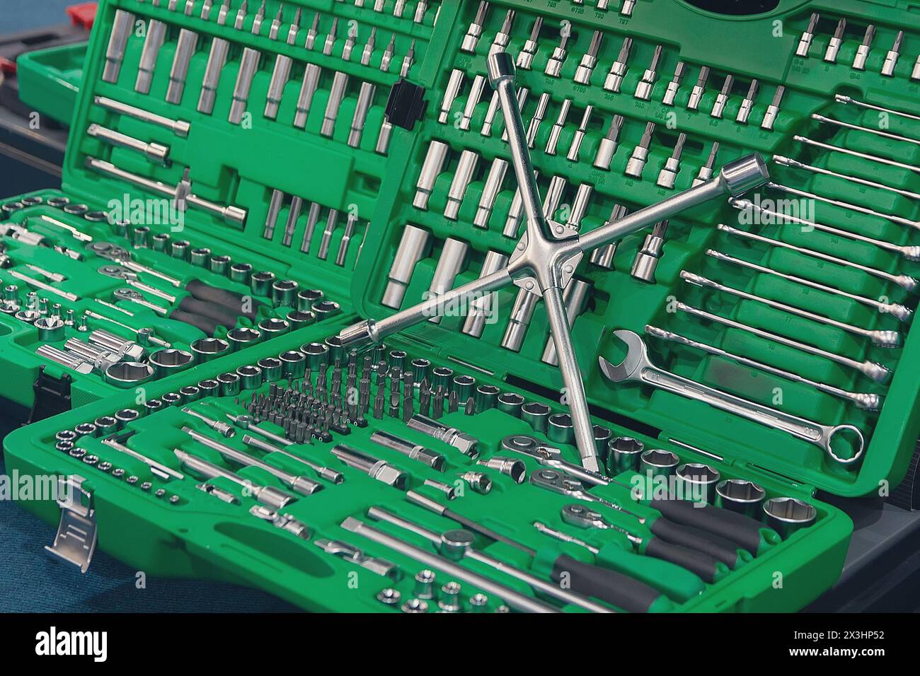 Tools and toolbox on the shop (store) showcase. Many wrench and nuts in ...