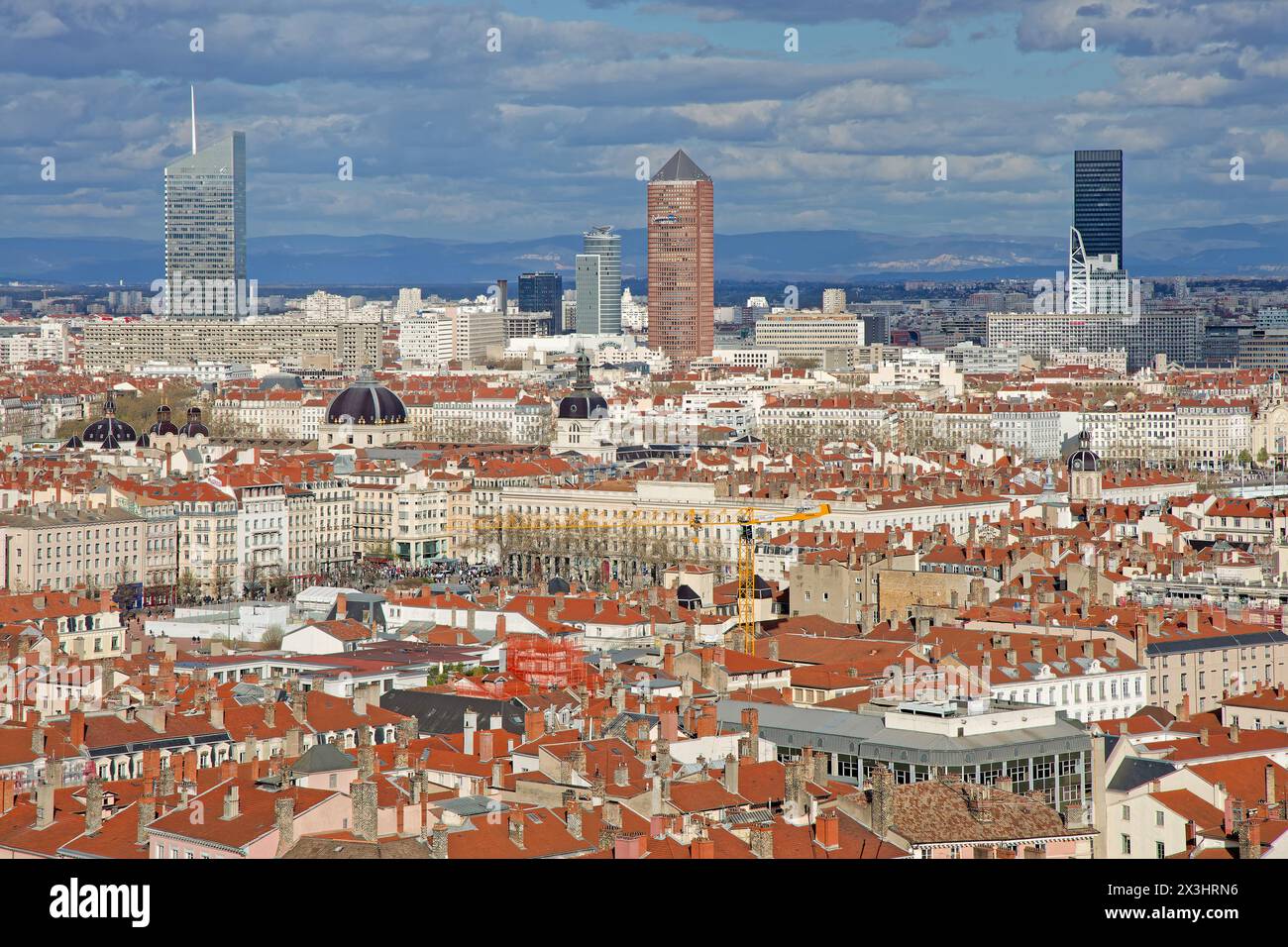 Modern towers over the roofs of Lyon city center Stock Photo - Alamy