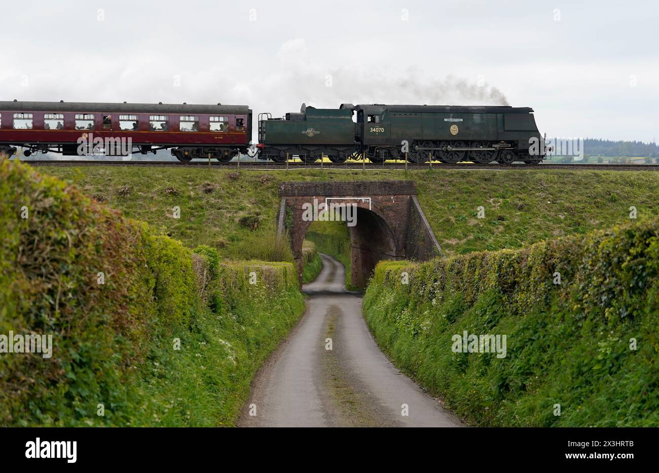 Battle of Britain Class steam locomotive No.34070 'Manston', pulls ...