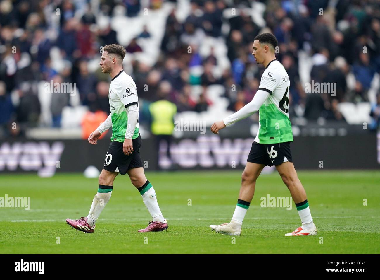 Liverpool's Alexis Mac Allister (left) and team-mate Trent Alexander ...