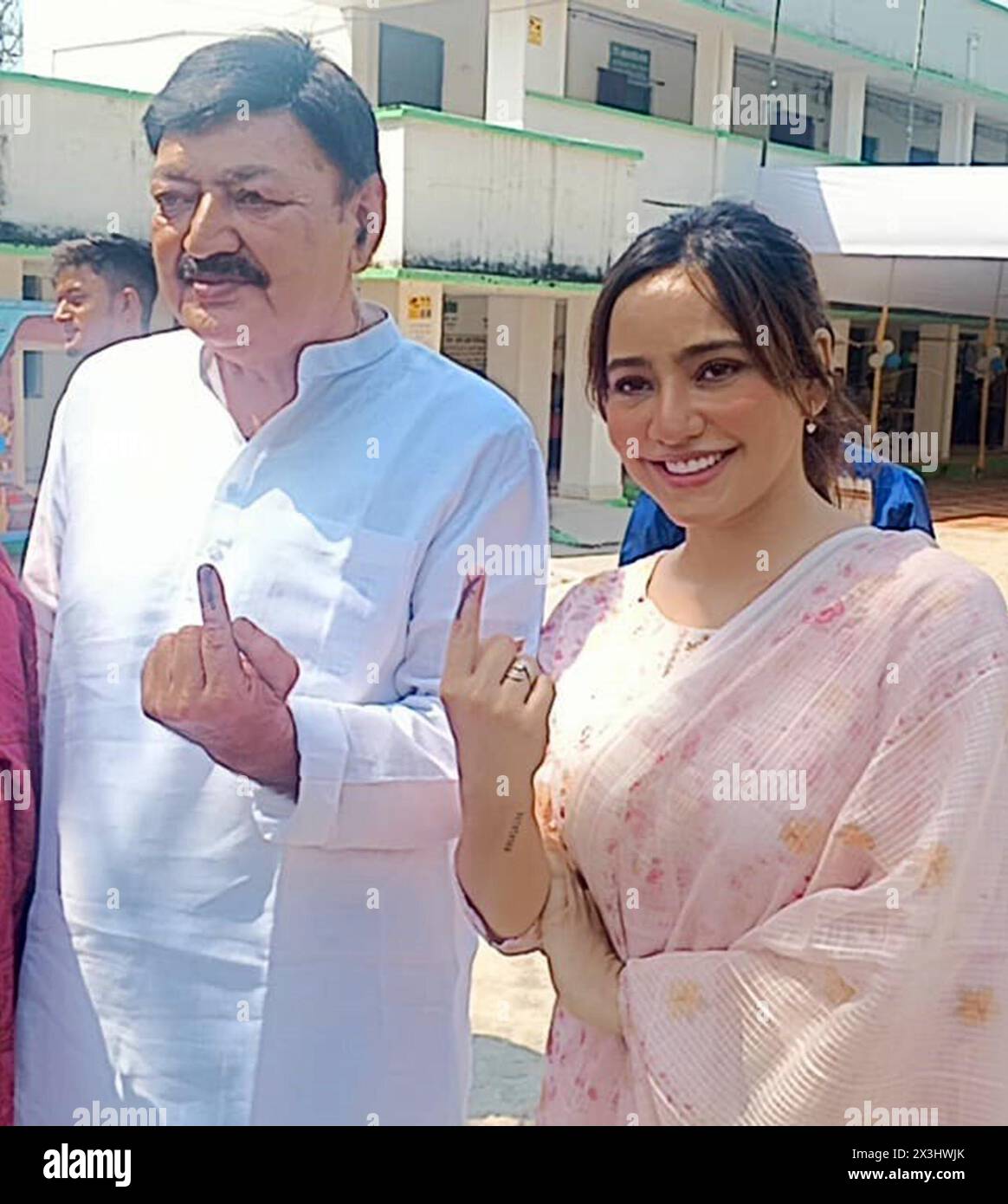 BHAGALPUR, INDIA - APRIL 26: Congress candidate Ajit Sharma with his daughter actor Neha Sharma ...