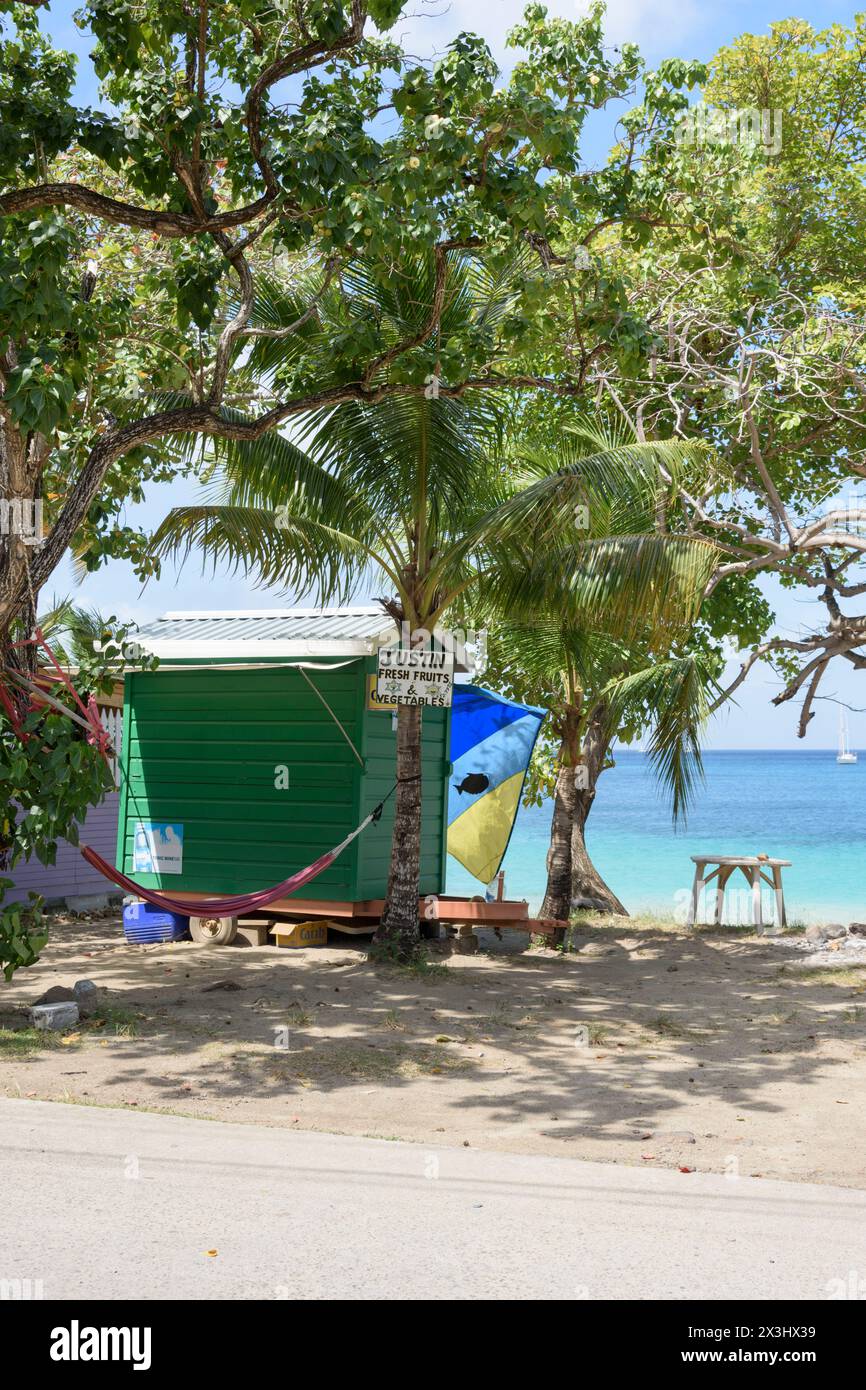 Painted wooden beach hut on Lower Bay beach, Lower Bay. Bequia Island ...