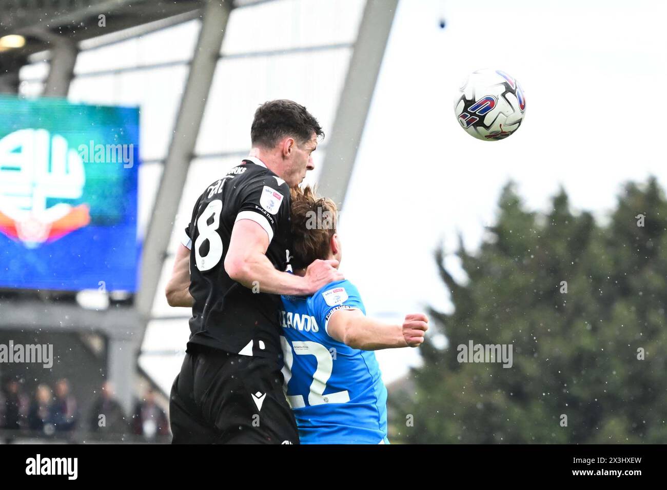 Josh Sheehan (8 Bolton Wanderers) challenged by Hector Kyprianou (22 ...