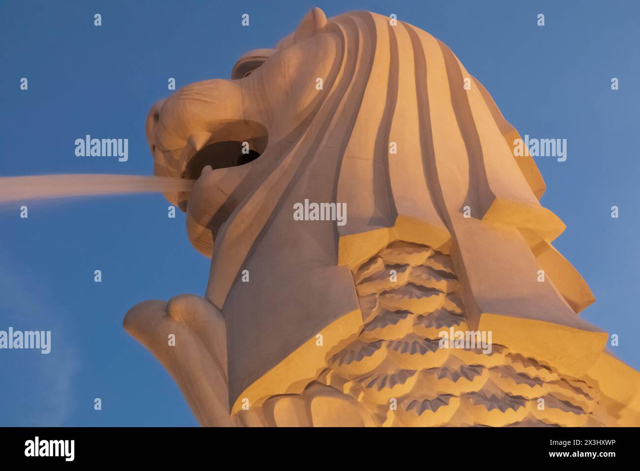 Asia, Singapore, Head of the Merlion Statue Illuminated at Dusk Stock ...