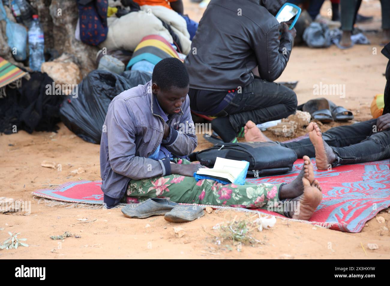 El Amra, Tunisia. 26th Apr, 2024. A migrant from Sub-Saharian Africa ...