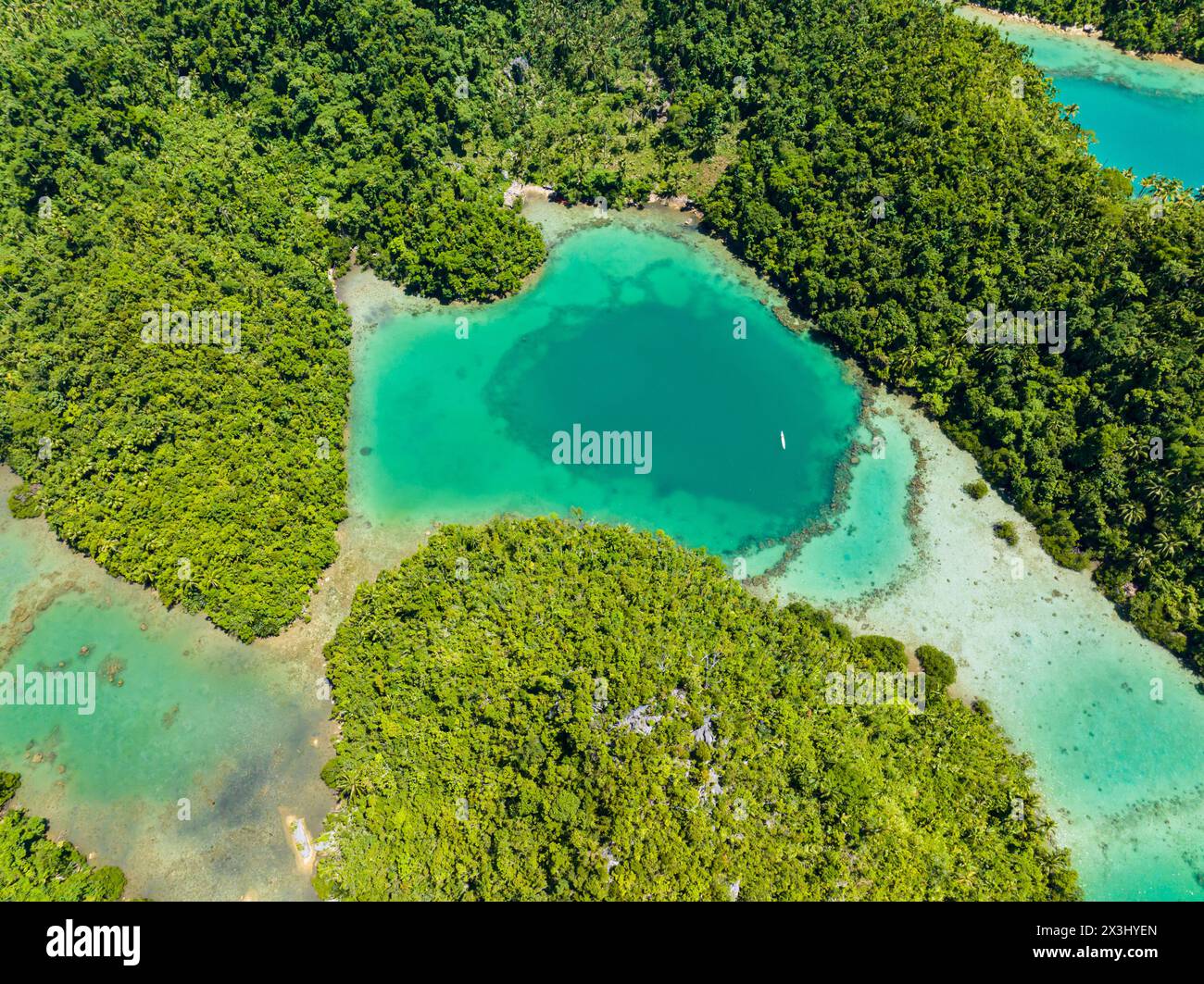 Top view of turquoise lagoon with beach in tropical island. Mindanao ...