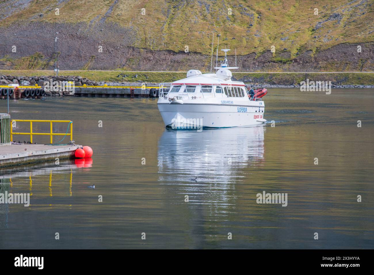 Isafjordur Iceland - August 25 2023: Passenger vessel entering port on ...