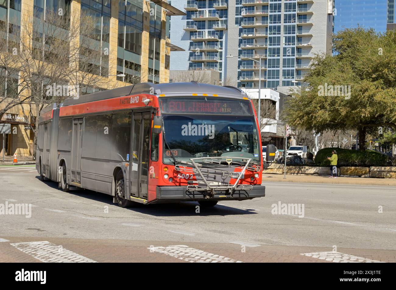 Austin, Texas, USA - 8 February 2023: Public service bus driving along ...