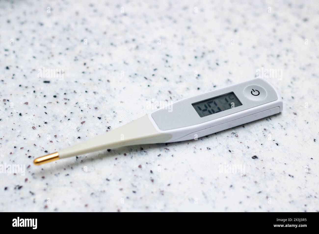 a digital thermometer shows a temperature of 40.1 degrees celsius High ...