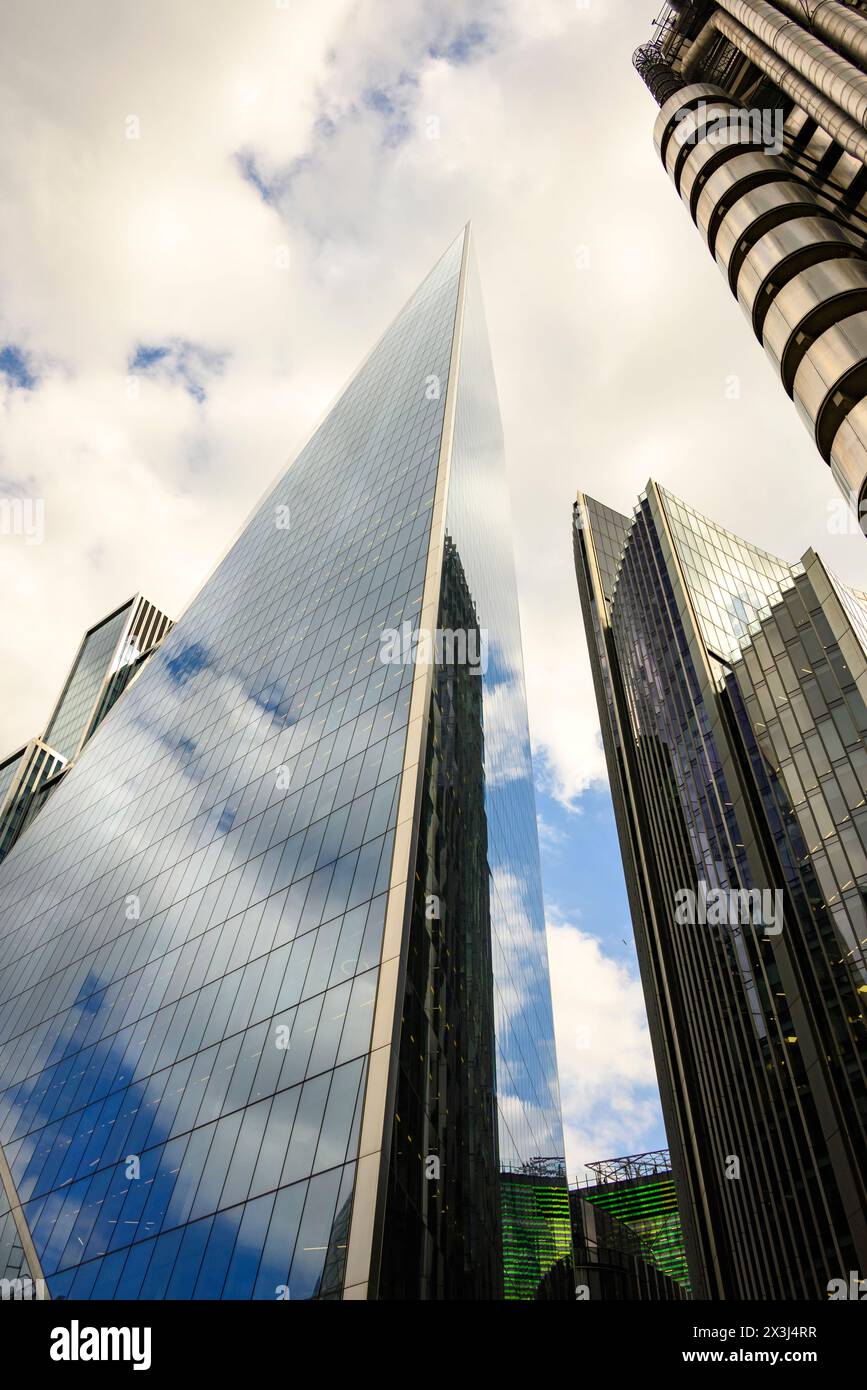 Glass and steel skyscrapers, office blocks, City of London, looking up ...
