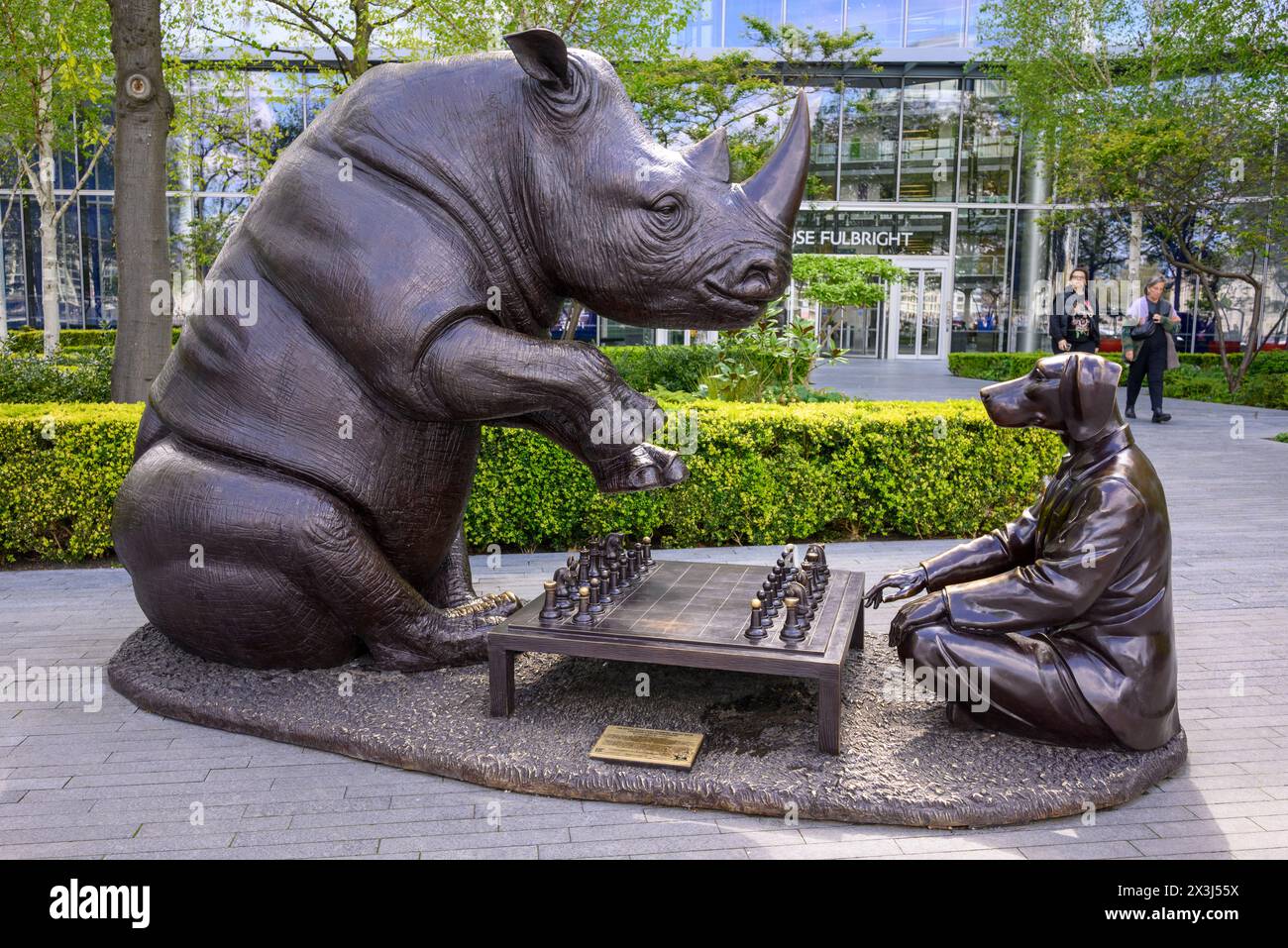 Sculpture by Gillie and Marc of a White Rhino and Dogman playing chess ...