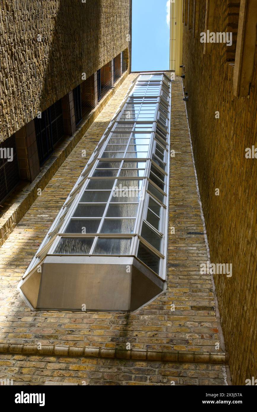 Long vertical window on Shad Thames, converted historic building ...