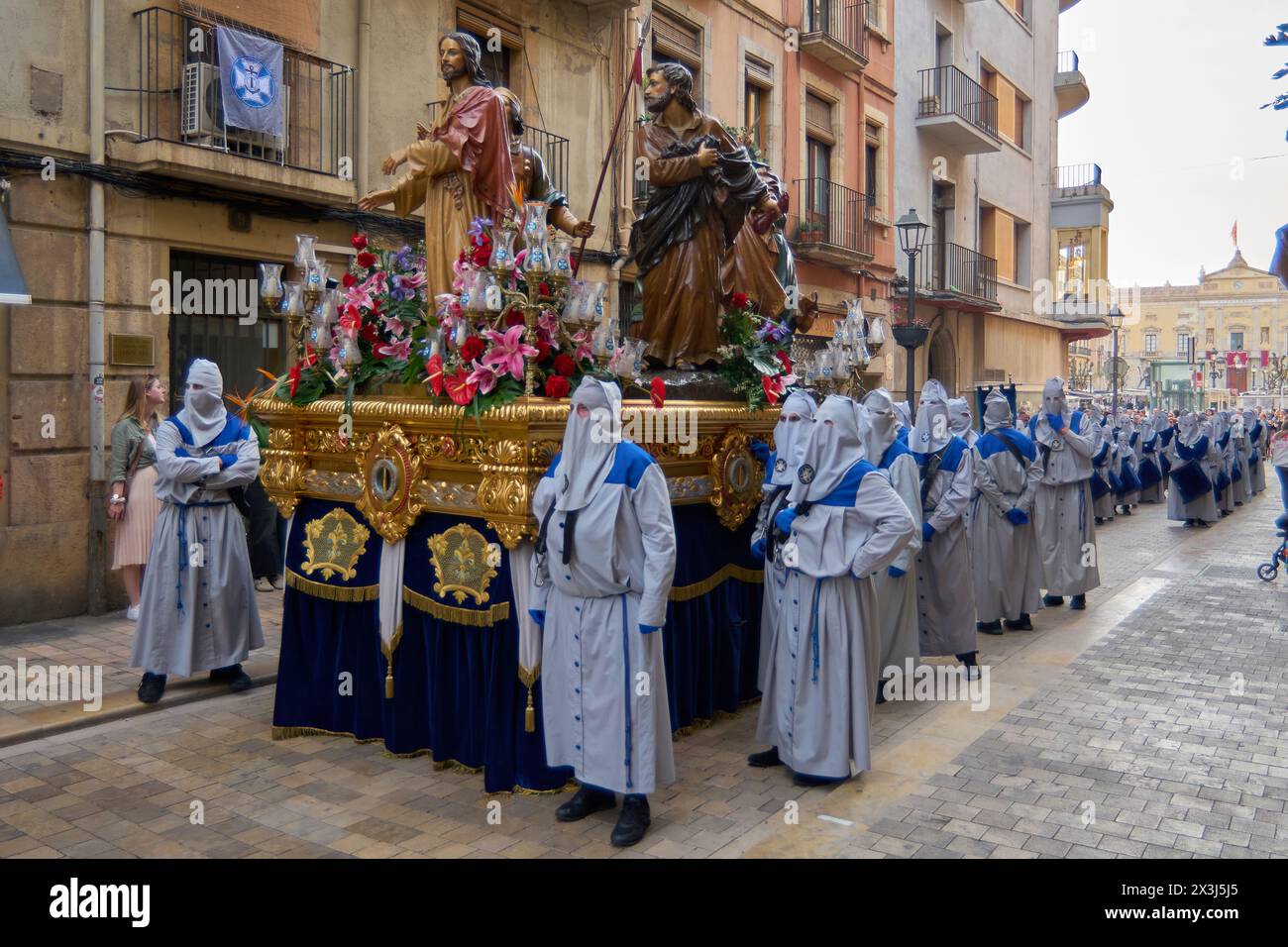 Tarragona, Spain - April 27, 2024: Nazarenos, with their distinctive ...