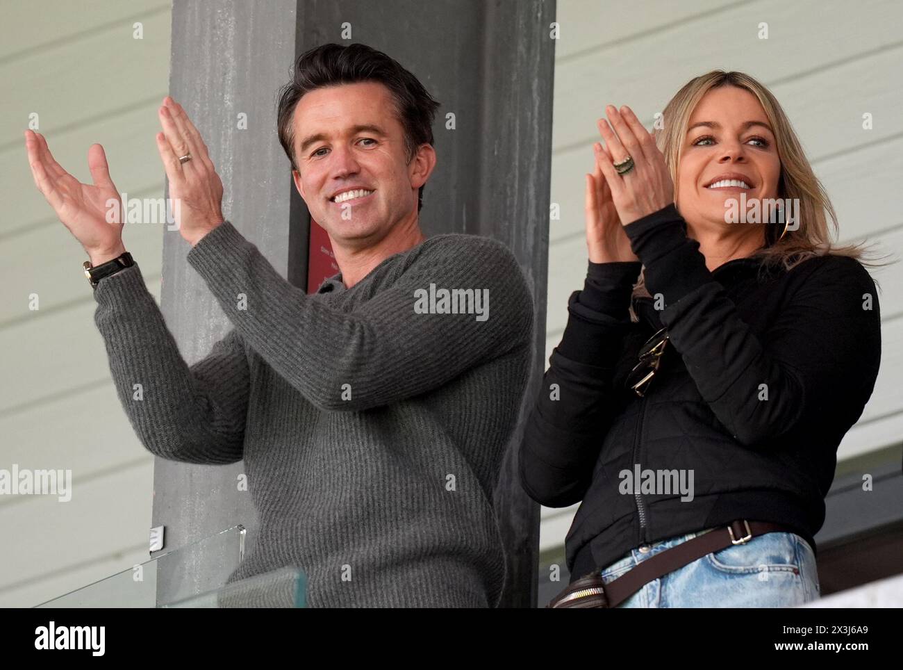 Wrexham co-chairman Rob McElhenney (left) and his wife Kaitlin Olson ...