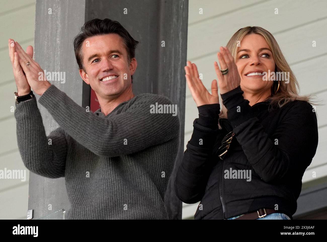 Wrexham co-chairman Rob McElhenney (left) and his wife Kaitlin Olson ...