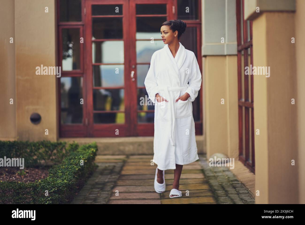 Outdoor, woman and walking at spa on holiday, relax and break for ...