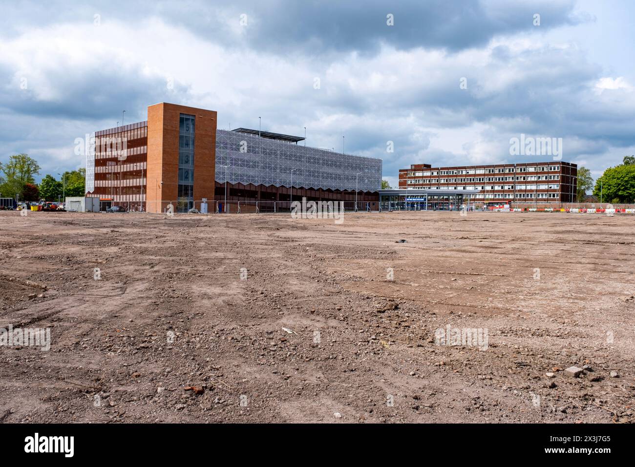 The multi storey car park with bus station and abandoned building site ...