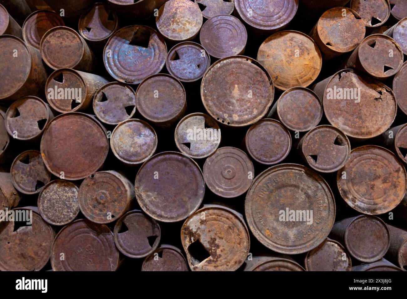 Old rusty and rusted tin cans for background Stock Photo - Alamy