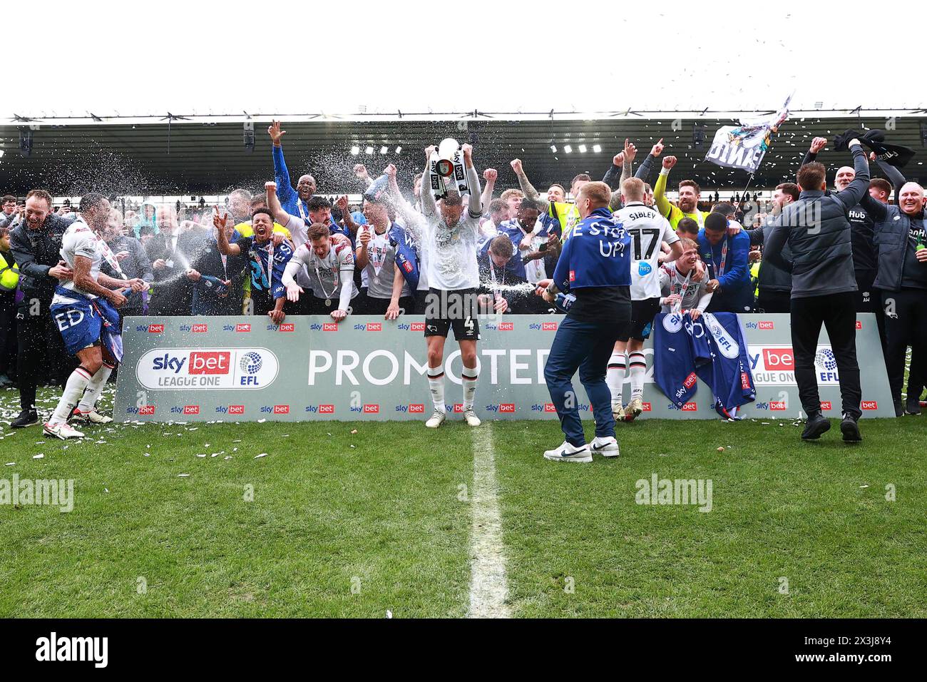 Derby, UK. 27th Apr, 2024. Derby County players celebrate promotion to ...