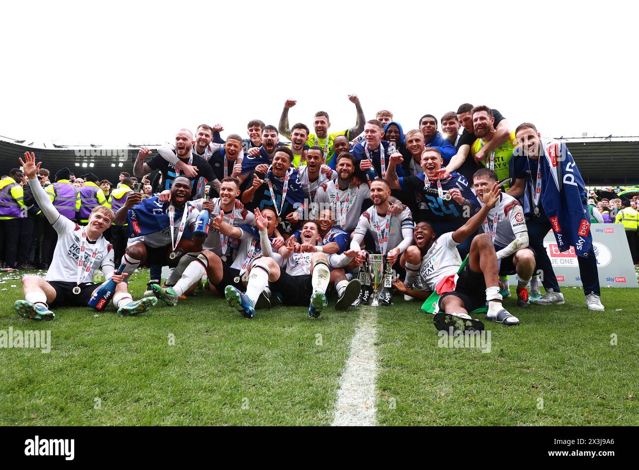 Derby, UK. 27th Apr, 2024. Derby County players celebrate promotion to ...