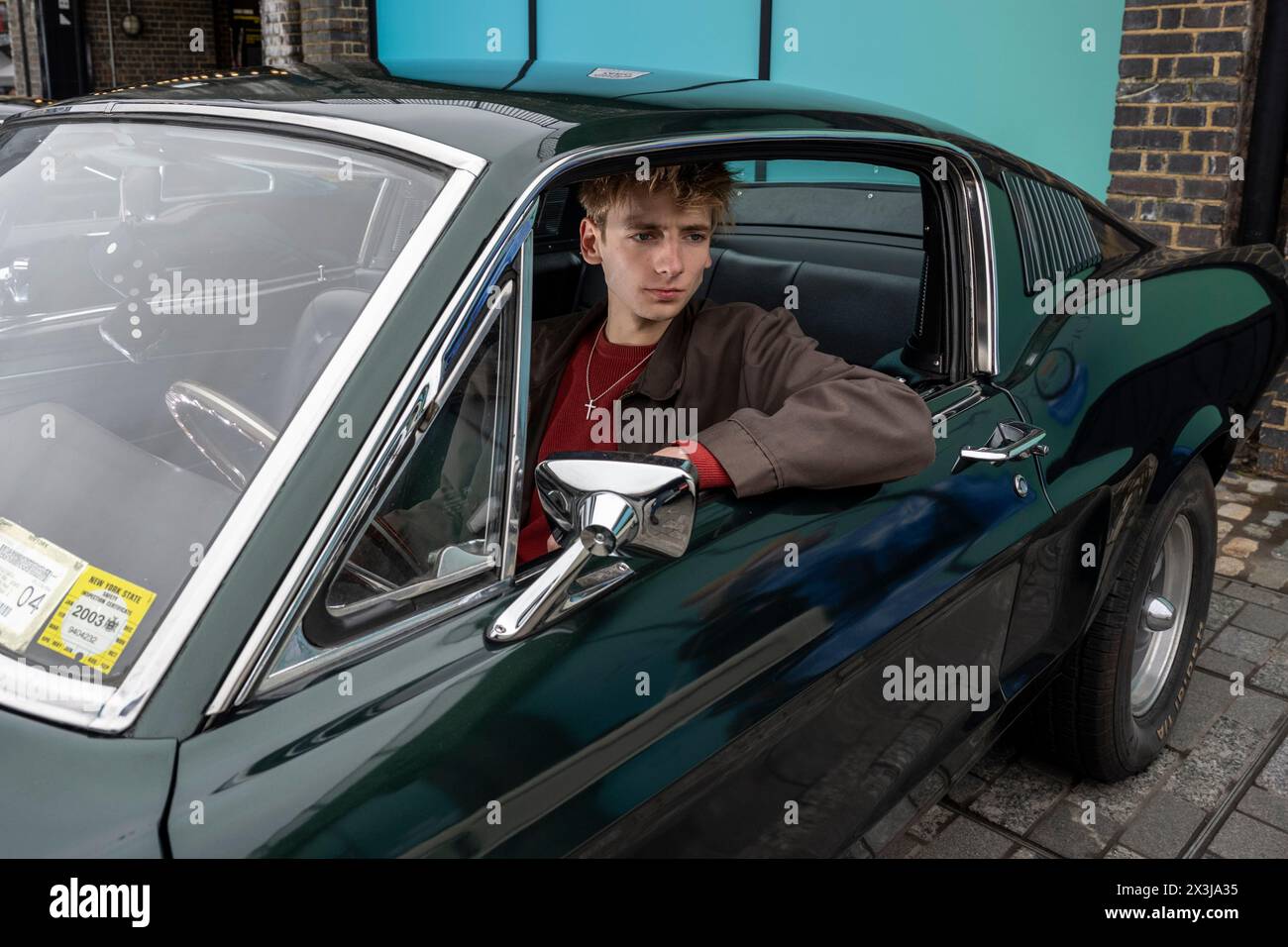 London, UK. 27 April 2024. Frankie Wilson 18, at the wheel of a Ford ...