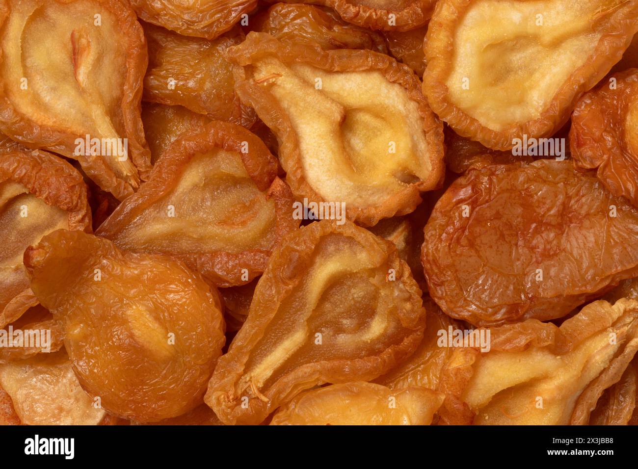 Sweet dried pear fruit close up full frame as background Stock Photo ...