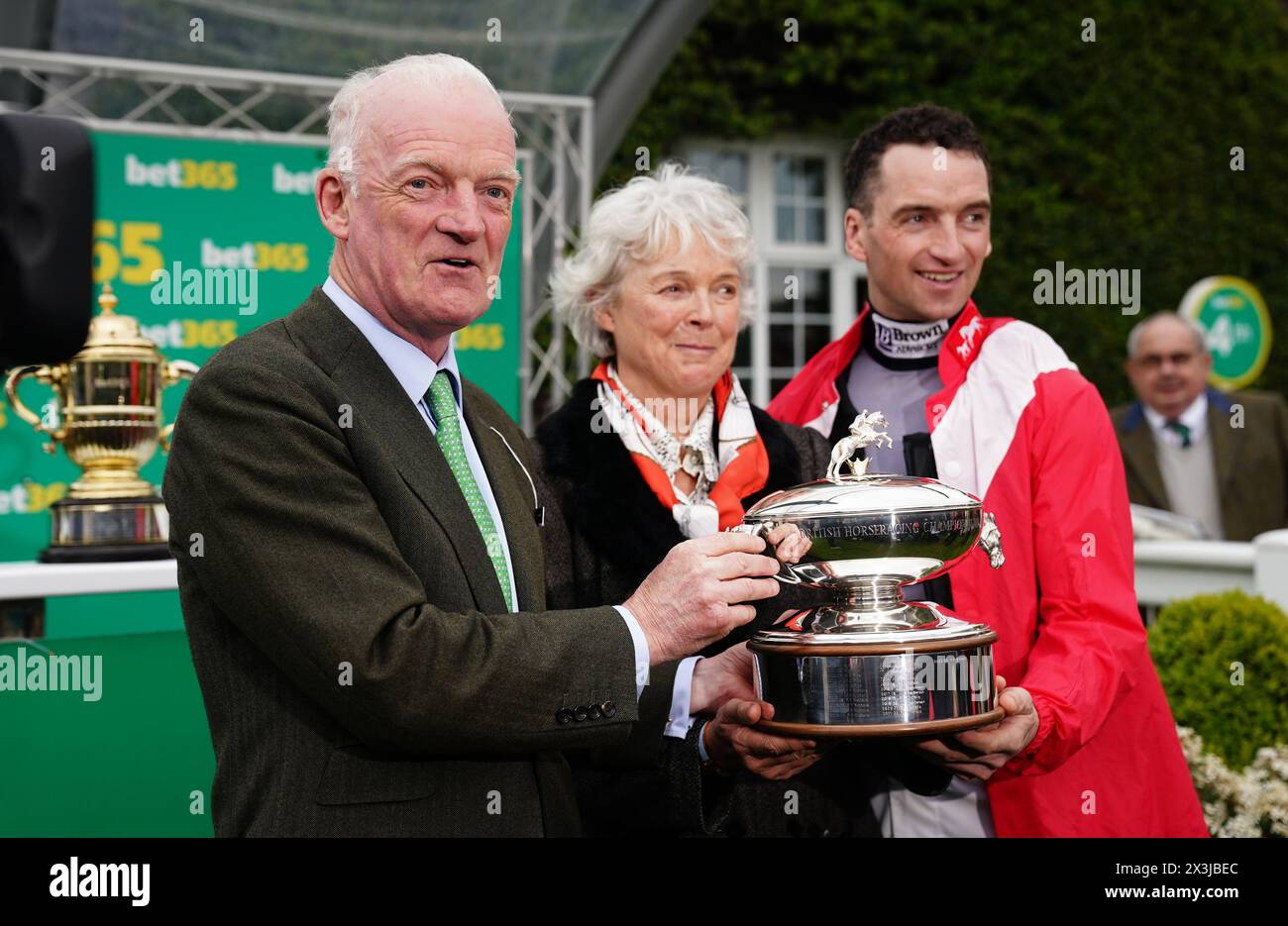 Winning trainer Willie Mullins poses with the Champion Trainer trophy ...