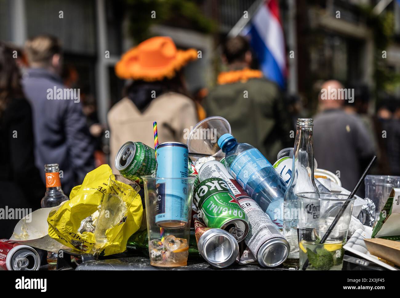 AMSTERDAM - Garbage and cans pile up during the celebration of King's ...