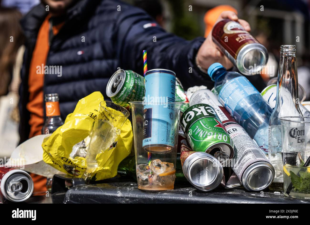 AMSTERDAM - Garbage and cans pile up during the celebration of King's ...
