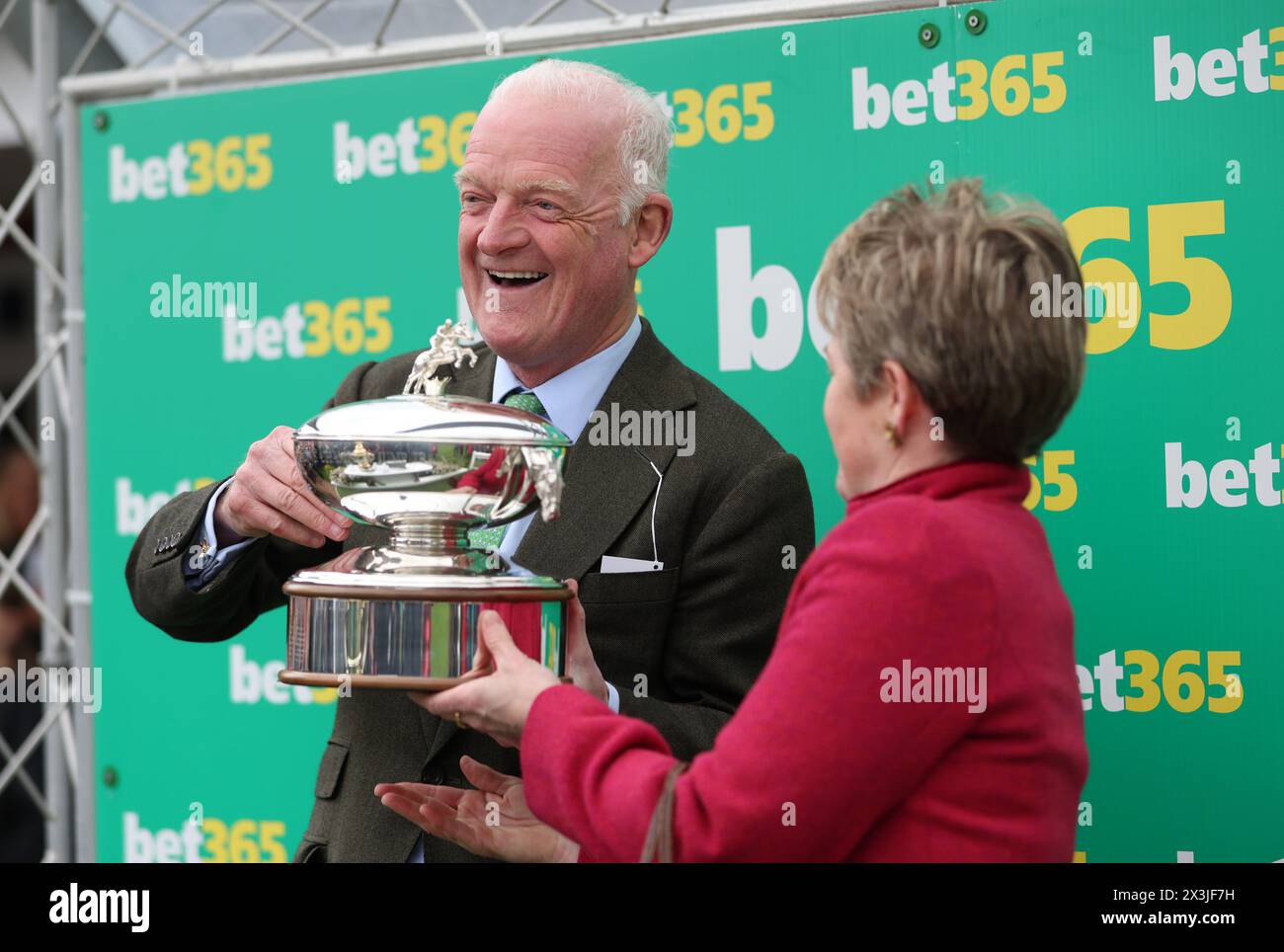 Winning trainer Willie Mullins poses with the Champion Trainer trophy ...