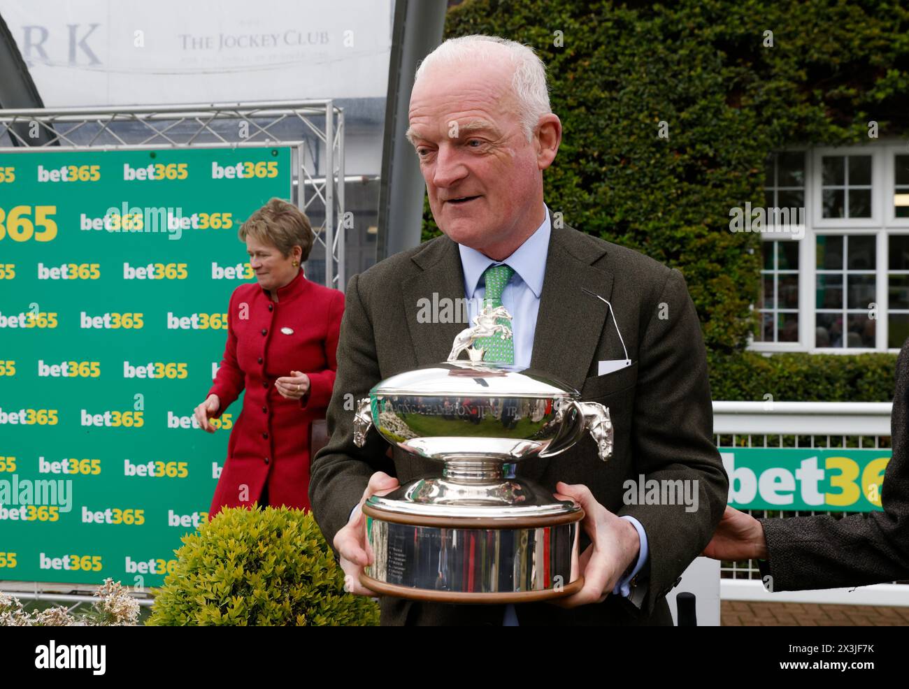 Winning trainer Willie Mullins poses with the Champion Trainer trophy ...