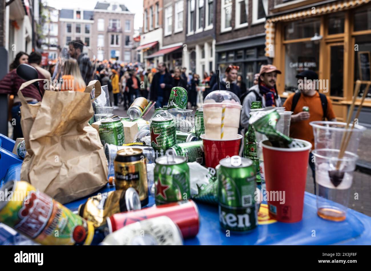 AMSTERDAM - Garbage and cans pile up during the celebration of King's ...