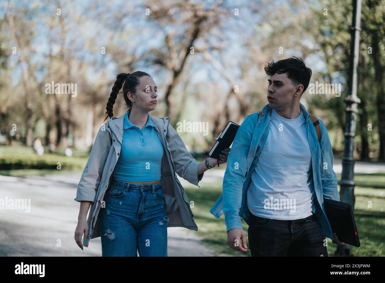 Teenage students walking talking hi-res stock photography and images ...