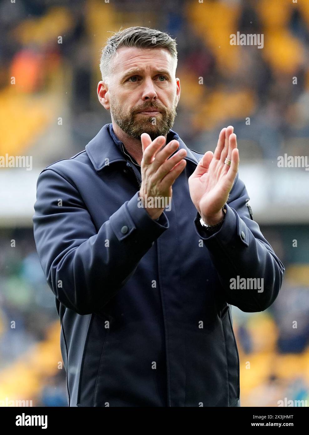 Luton Town manager Rob Edwards applauds the fans following the Premier ...