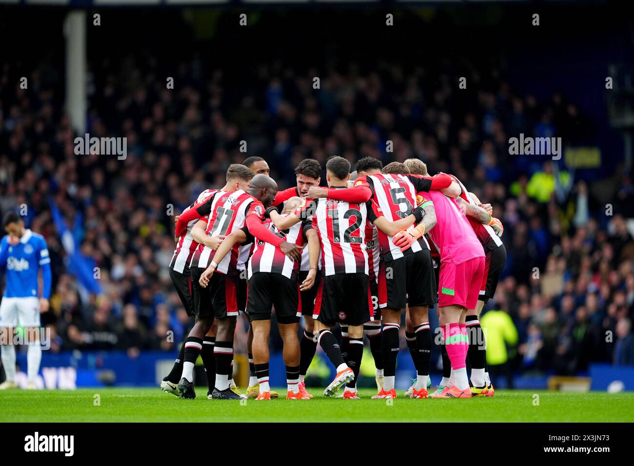 Brentford's players in the huddle before the Premier League match at ...