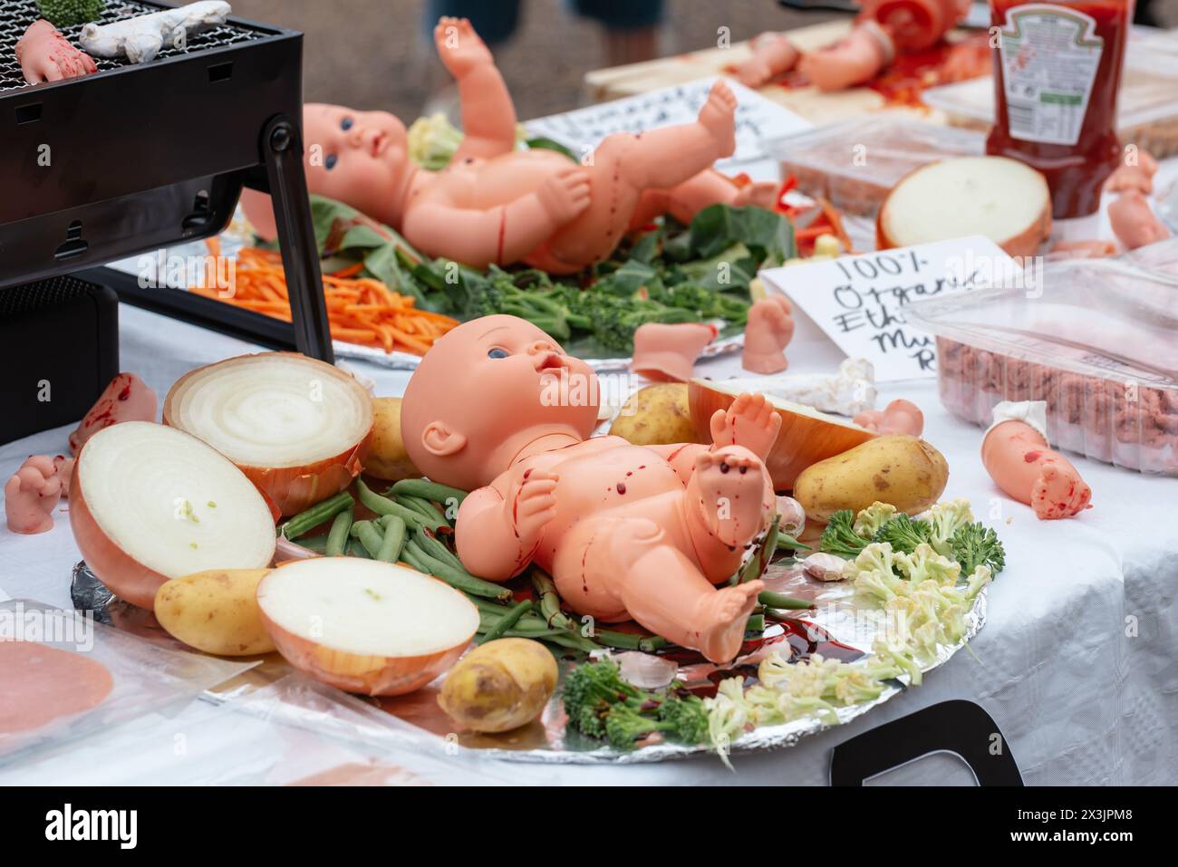London, UK. 27 April 2024. Vegan activists from Radically Kind stage a ...