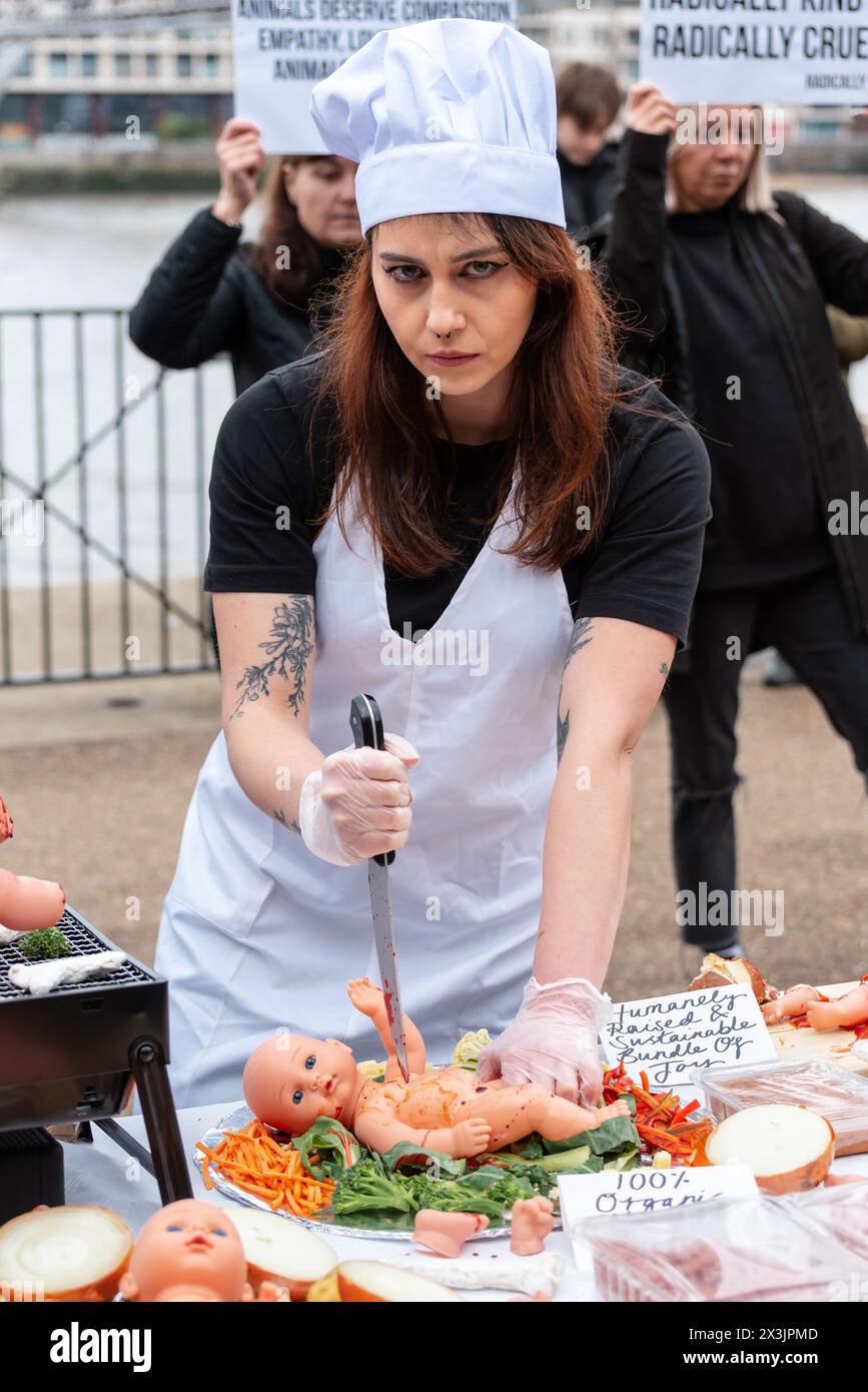 London, UK. 27 April 2024. Vegan activists from Radically Kind stage a ...