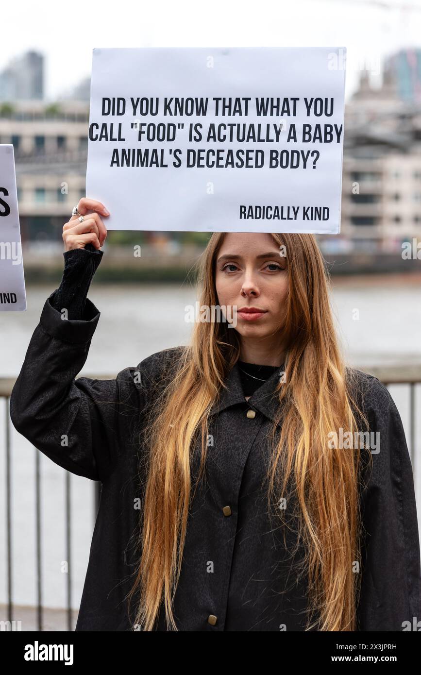 London, UK. 27 April 2024. Vegan activists from Radically Kind stage a ...