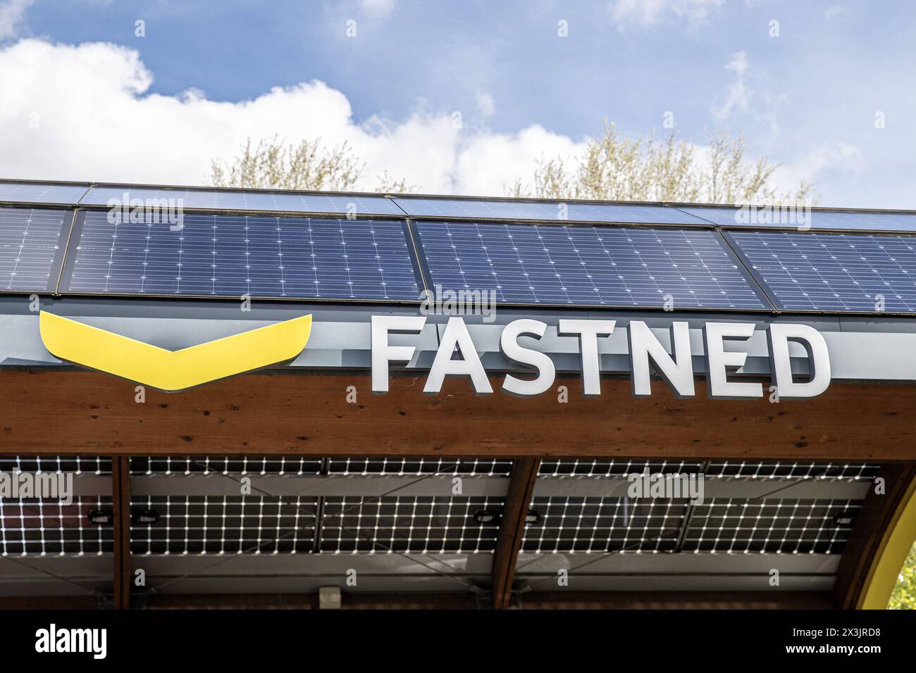 HANK - The FastNed logo along the A27 highway near Hank. Fastned is a ...